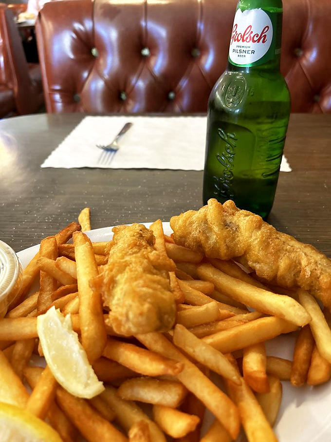 The classic fish and chips alongside a cold beer – a pairing so perfect it should have its own national holiday.