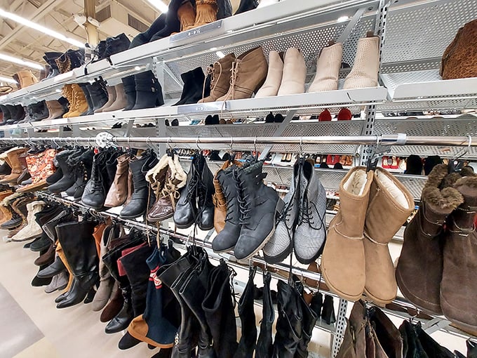 The footwear section—where hiking boots and stilettos coexist in peaceful harmony, like a United Nations of abandoned shoes.
