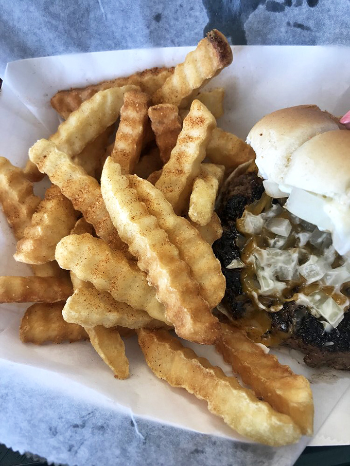 These aren't just french fries—they're crispy, golden vehicles for ketchup, mayo, or whatever condiment makes your heart sing. Ridges for maximum dipping efficiency.