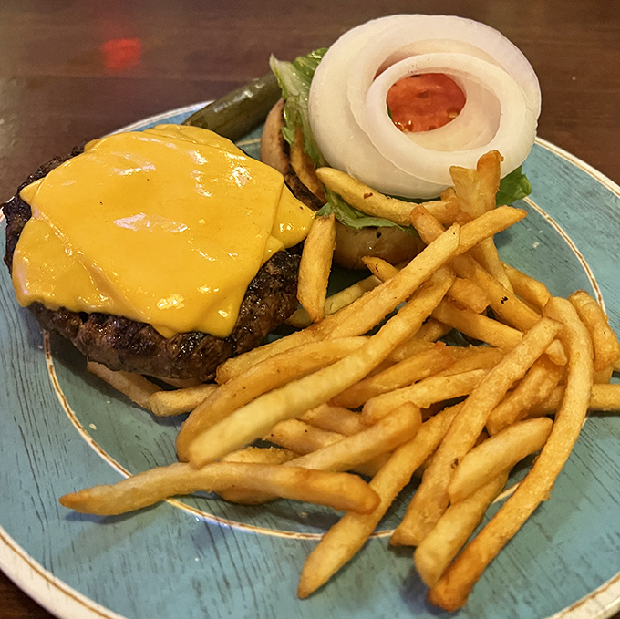 Sometimes simplicity is sublime. A perfectly melted cheeseburger with golden fries—the comfort food equivalent of a warm hug.