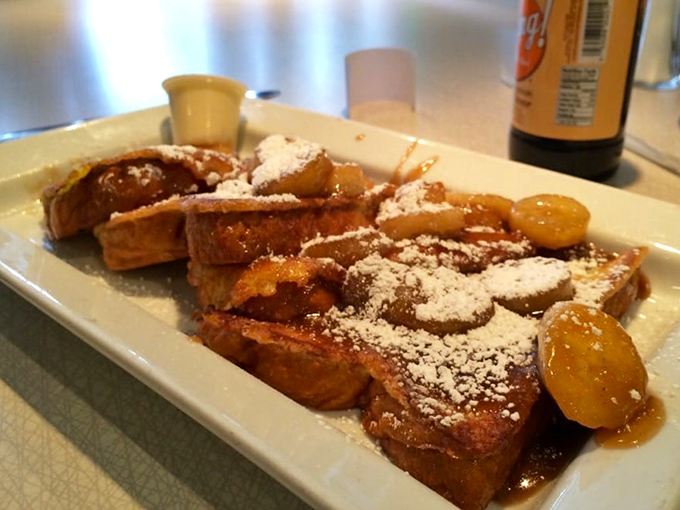 French toast that looks like it was dusted by angels – powdered sugar has never looked so inviting.