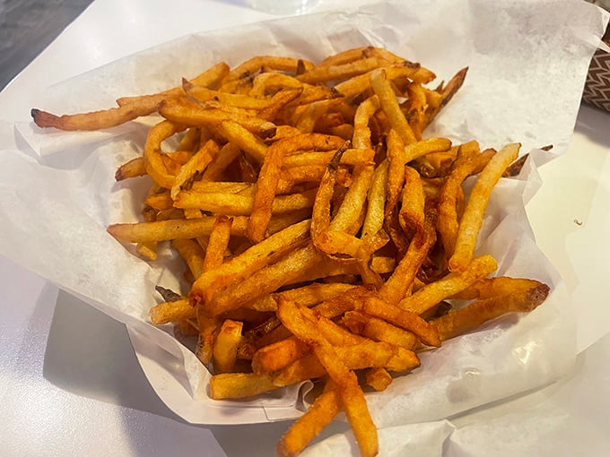These aren't just fries—they're golden happiness sticks, hand-cut with the kind of care usually reserved for fine jewelry.