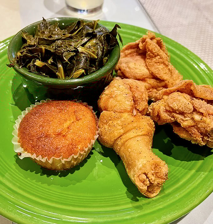 The holy trinity of Southern comfort: crispy fried chicken, tender collard greens, and cornbread that crumbles just right. Soul food's greatest hits album.