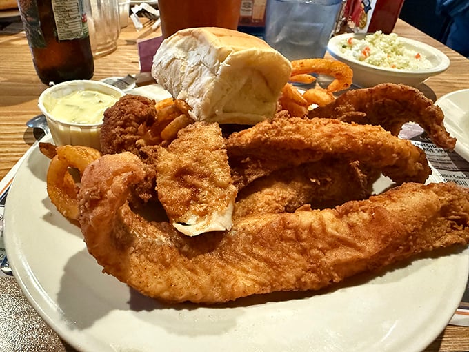 This isn't just a plate of food—it's an archaeological dig of deliciousness. Each golden layer of fried goodness tells a different story of perfection.
