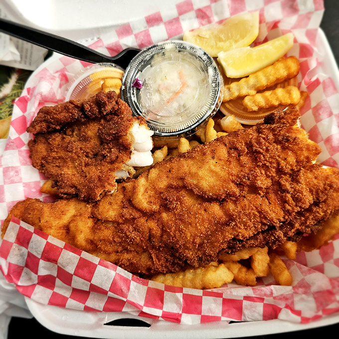 Golden-fried haddock that shatters with each bite, paired with fries that could make a Frenchman weep with joy.