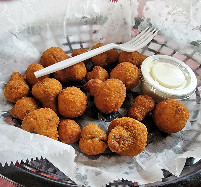 These golden-fried mushrooms aren't just appetizers—they're little umami bombs waiting to explode with flavor at first bite. 