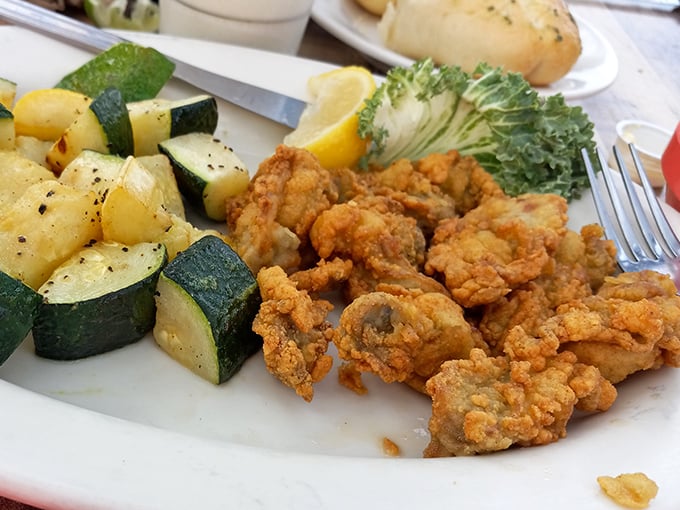 These fried oysters aren't just food – they're little golden nuggets of the sea, crispy outside and briny-sweet inside.