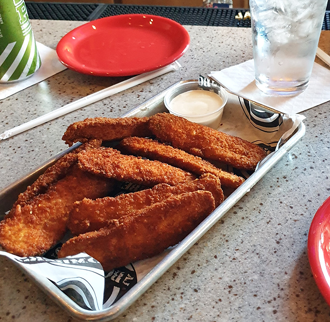 These aren't just fried pickles—they're a masterclass in contradictions: crunchy outside, tangy inside, and somehow both virtuous and decadent at once.