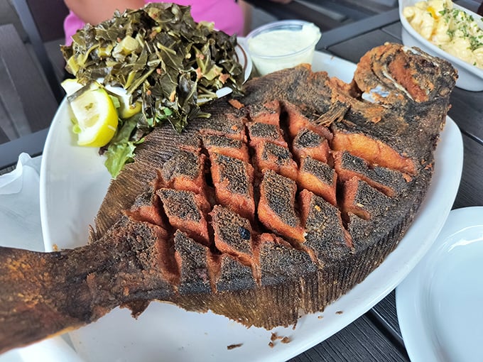 This isn't just a fish—it's a masterclass in the art of scoring and grilling, wearing its char marks like delicious battle scars.