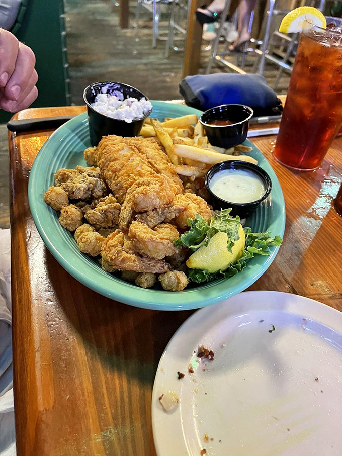 Golden-fried seafood that makes a satisfying crunch you can practically hear through the photo. That sweet tea looks like liquid salvation.