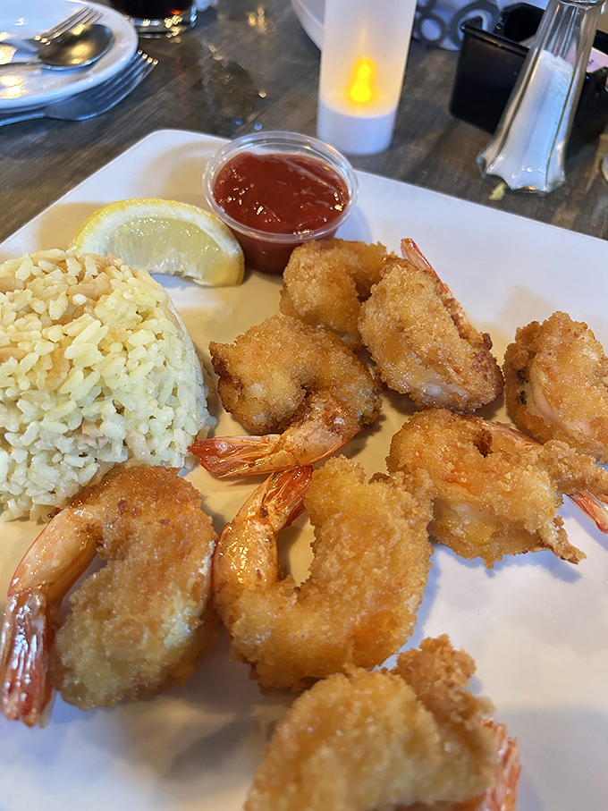 Golden fried shrimp with perfectly fluffy rice – comfort food that would make your grandmother proud and slightly jealous.