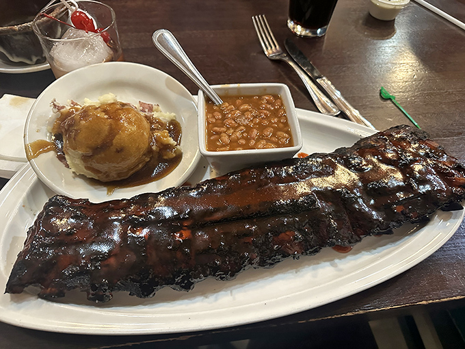 Behold the holy grail of barbecue – a full slab of ribs with sauce so good you'll be tempted to drink it.