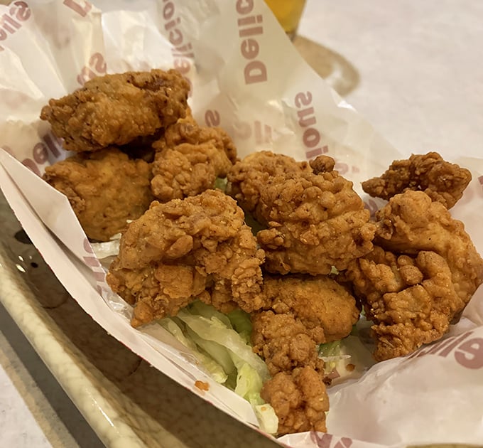 Golden-fried nuggets of happiness nestled in a paper-lined basket. The perfect crunch-to-tenderness ratio makes these bites disappear faster than your resolution to eat light.