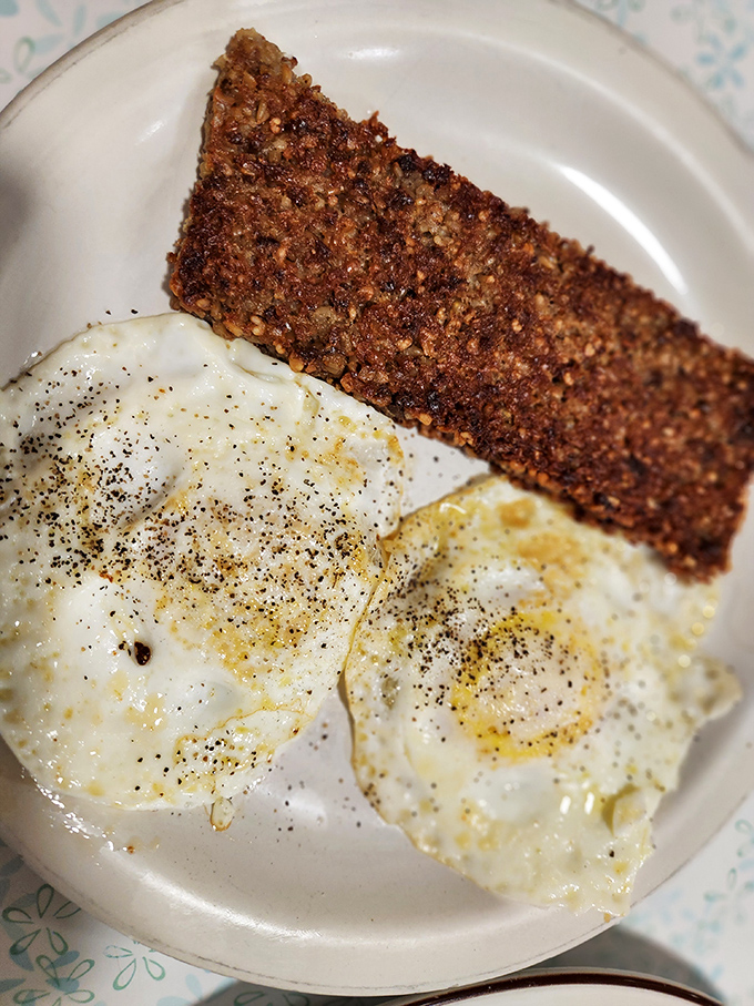 Crispy-edged goetta with perfectly fried eggs—a Cincinnati specialty that makes outsiders ask "What's that?" and locals say "Heaven on a plate."