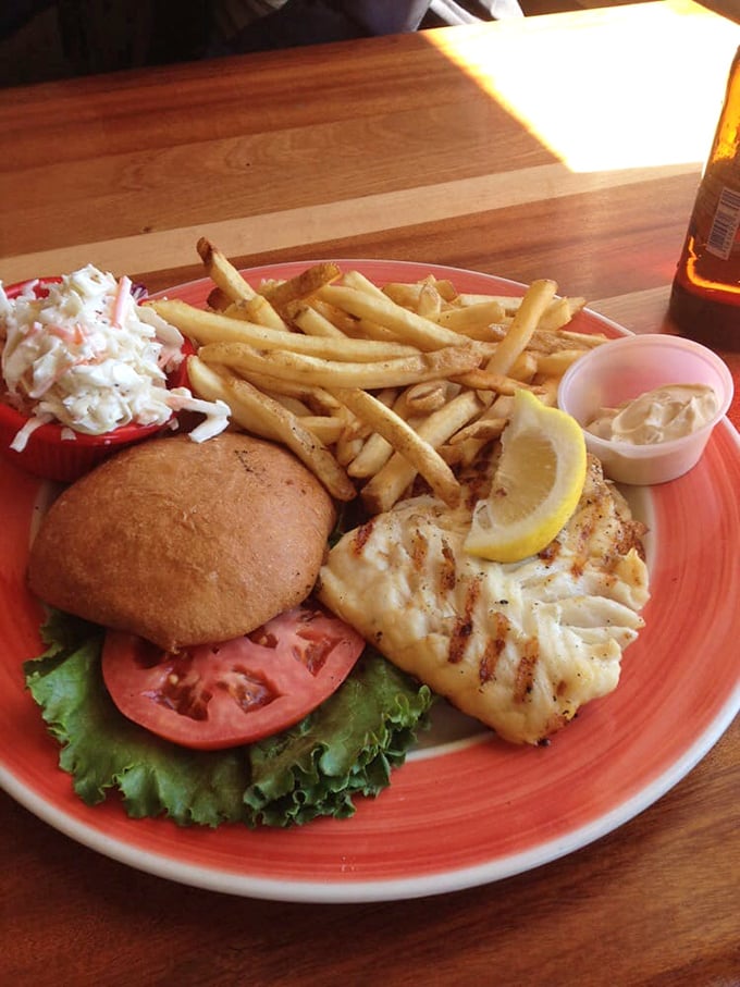 The grouper sandwich that launched a thousand road trips. Golden, flaky fish meets fresh veggies in a relationship that makes marriage counselors jealous.