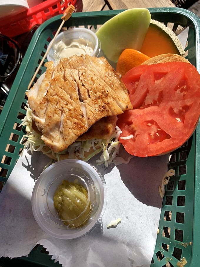 Simple yet profound—this grilled mahi on fresh slaw with a side of paradise. That slice of melon isn't dessert, it's a palate-refreshing intermission.