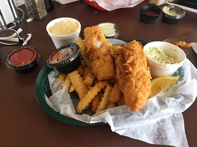 The fish basket that launched a thousand road trips. Crispy, flaky grouper with fries that deserve their own fan club.