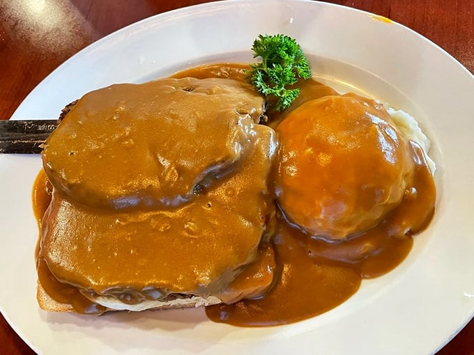 Hot meatloaf smothered in gravy—the kind of comfort food that makes you want to call your mother and apologize for everything you've ever done.