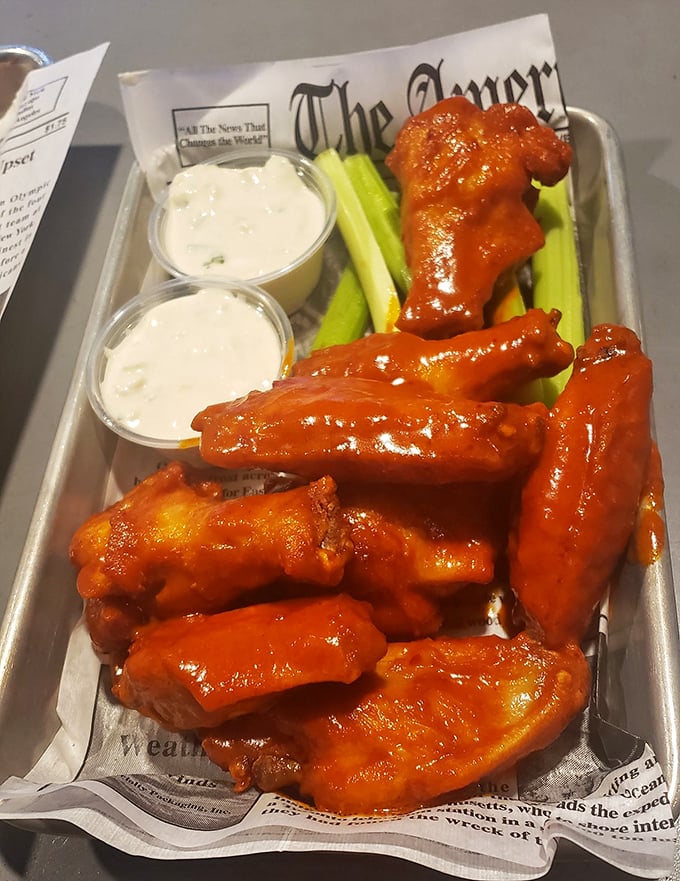 Wings that wear their sauce like a proud battle uniform. These aren't just spicy—they're the kind that make you both sweat and immediately reach for another.