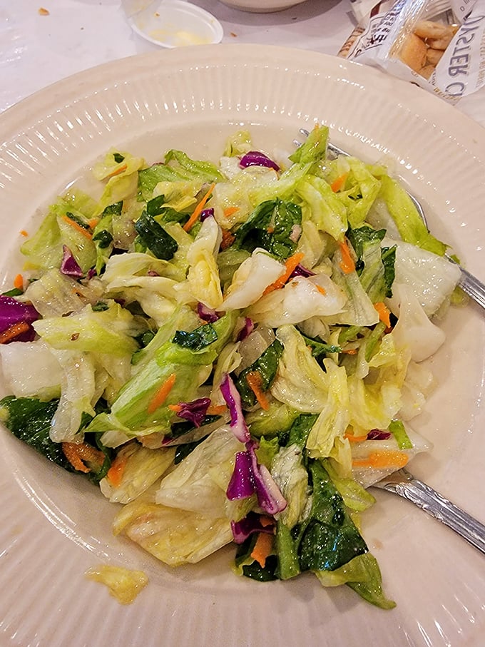 Even the house salad gets the respect it deserves – a crisp, colorful medley that proves vegetables can be more than just an obligation before the pasta arrives.