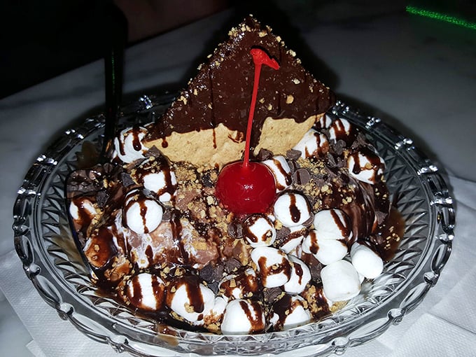 This isn't just a sundae, it's an architectural marvel! Layers of ice cream, toppings, and chocolate create a dessert skyscraper that demands to be demolished.