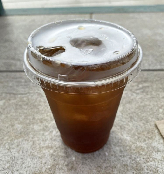 Sometimes the simplest pleasures win—a cold iced tea on the pier, with nothing but ocean views and taco anticipation.
