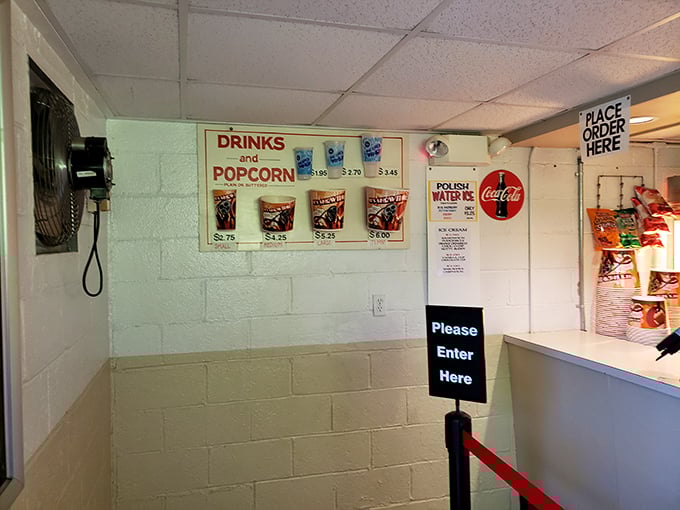 Movie theater candy hits different when you're watching under stars instead of ceiling tiles. The snack bar—where memories are made between features.