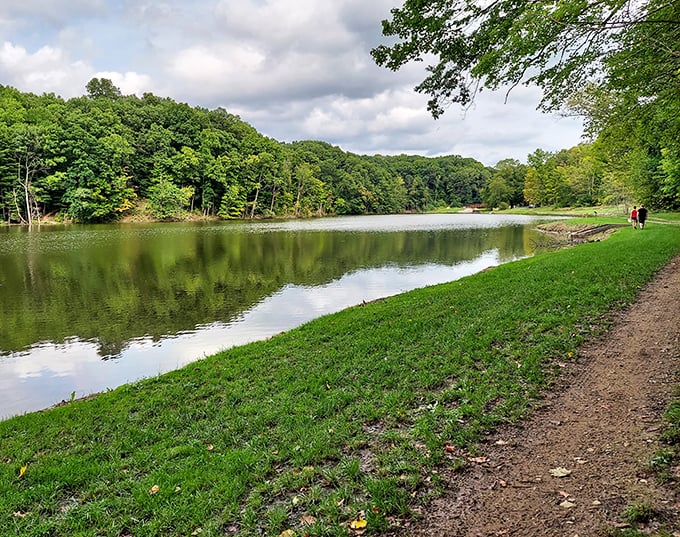 The lake trail offers that rare combination – flat enough for casual strollers but scenic enough to make serious hikers stop and appreciate.