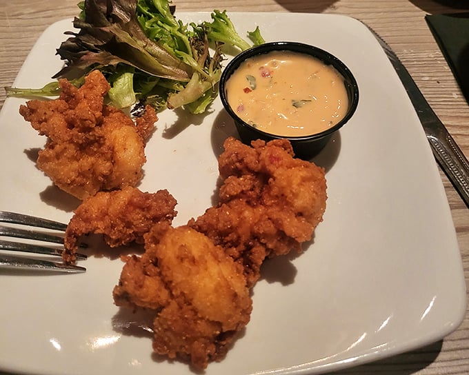 These golden-fried morsels come with a sauce so good you'll be tempted to drink it straight—restraint recommended, spoons provided.