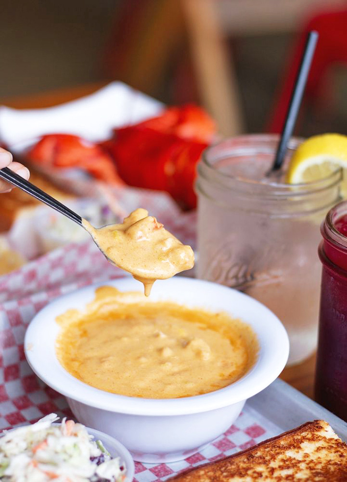 A spoonful of this lobster chowder is like a warm hug from the Atlantic Ocean – if hugs were buttery, rich, and studded with seafood treasure.