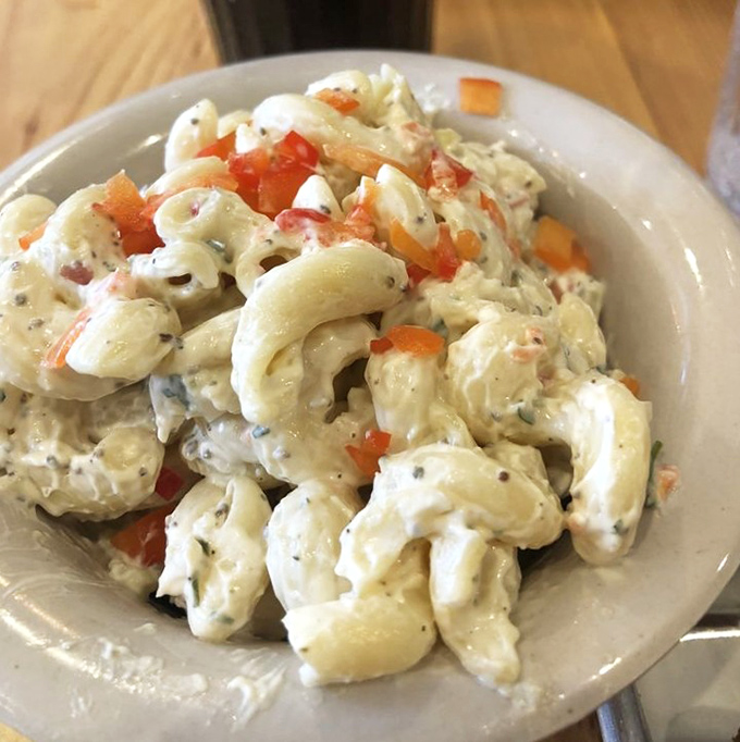 This macaroni salad isn't just a side dish—it's a supporting actor that steals every scene. The little pops of red pepper add perfect flavor punctuation.