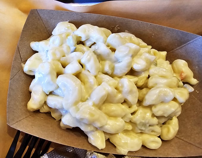 Mac and cheese so creamy it could make a cardiologist weep. Worth every minute on the treadmill you'll promise yourself tomorrow.