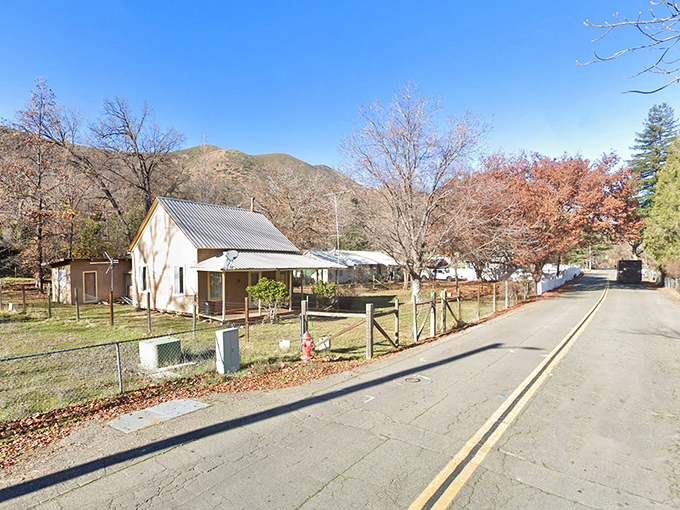 A modest home along the main road speaks to French Gulch's unpretentious charm, where rustic simplicity and mountain views are the real luxury amenities.