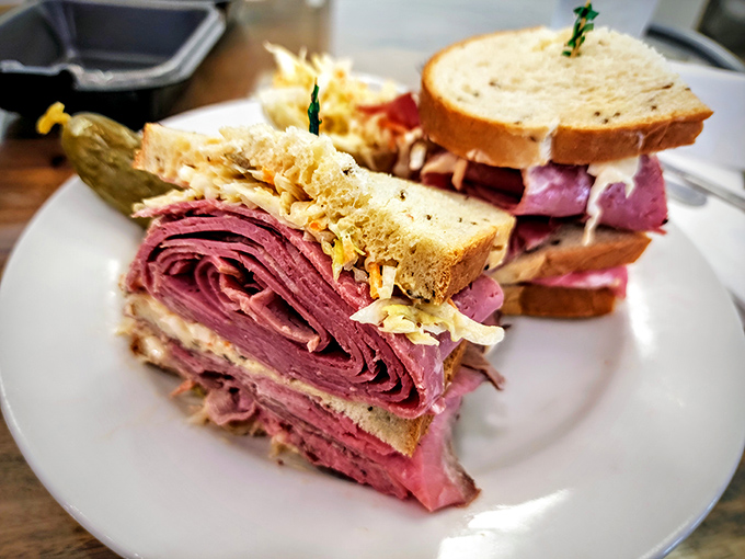 This isn't just a sandwich—it's a skyscraper of pastrami architecture that would make Manhattan proud. The meat-to-bread ratio here deserves a standing ovation.