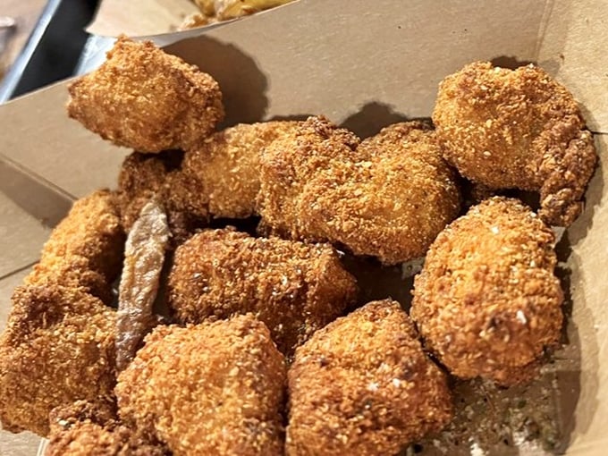 Golden-fried nuggets with a perfectly crispy exterior – the supporting cast that steals scenes from the headlining hot dogs.