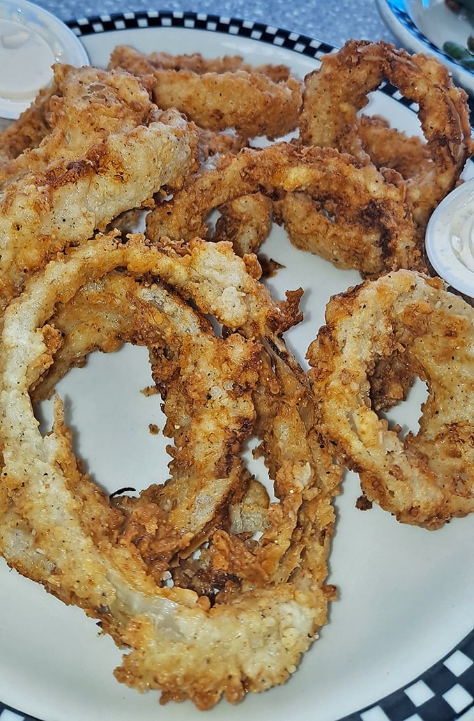 These aren't just onion rings—they're golden halos of crispy perfection. The kind that make you forget vegetables are supposed to be healthy.