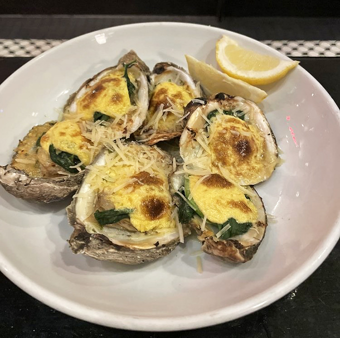 Oysters Rockefeller looking so dapper in their spinach, cheese, and breadcrumb finery. These mollusks dressed for the occasion and brought the flavor party.