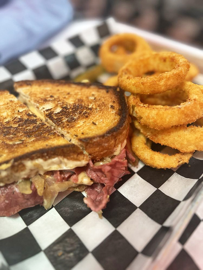 The patty melt—that beautiful marriage of grilled bread, melted cheese and seasoned beef—flanked by onion rings crisp enough to make you weep with joy.