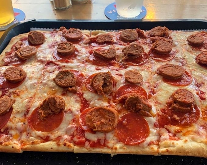 When pepperoni and sausage join forces on an Old Forge tray, resistance becomes futile and second helpings become inevitable.