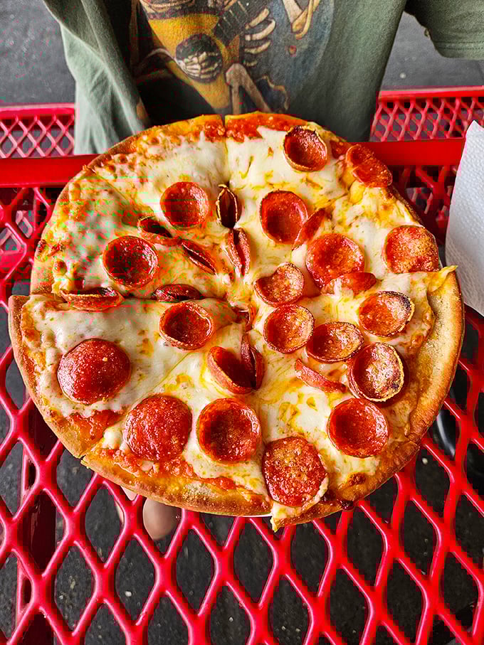 Pizza perfection doesn't always need fancy toppings—sometimes it's just the right ratio of cheese to pepperoni on a perfectly crisp crust.