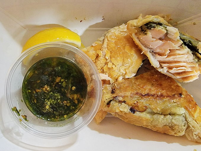 This salmon puff pastry with pesto dipping sauce isn't just lunch—it's a Mediterranean vacation on a compostable plate. No passport required!