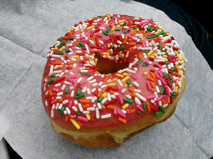Pink frosting and rainbow sprinkles—the universal symbol for "today is going to be better than yesterday," no prescription required.