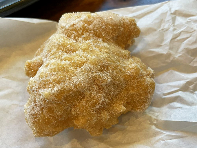 The Portuguese donut (malasada) comes dusted with enough sugar to ensure evidence of your breakfast choices remains on your shirt all day.