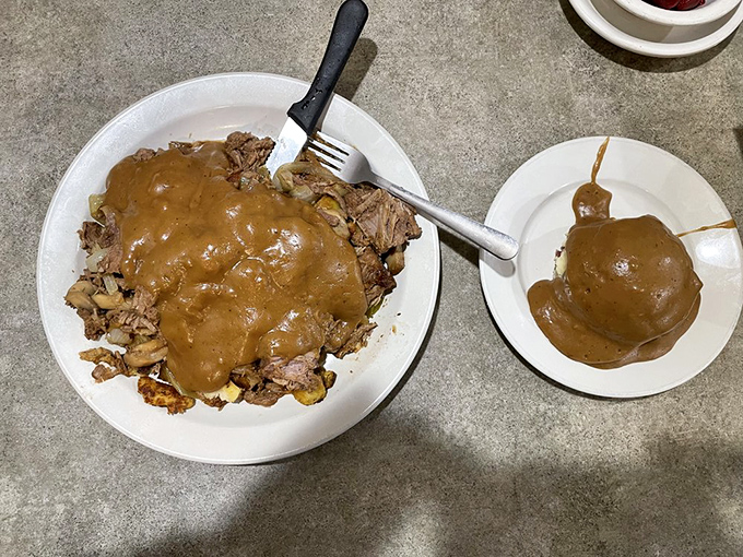 Pot roast that doesn't just fall apart—it surrenders completely. The gravy alone deserves its own fan club and merchandise line.