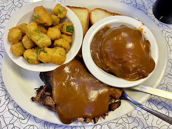 Comfort food so tender it falls apart at the mere suggestion of your fork, crowned with gravy that deserves its own love song.