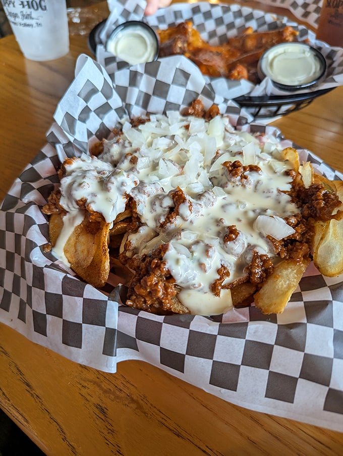 When loaded fries meet their destiny—smothered in savory pulled pork, melted cheese, and onions—you'll wonder why you ever ate potatoes any other way.