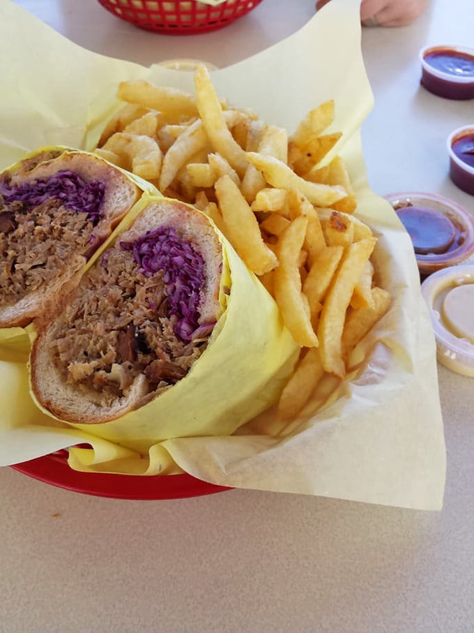 The pulled pork sandwich with its vibrant purple slaw doesn't just satisfy hunger—it creates memories your taste buds will reminisce about for weeks.