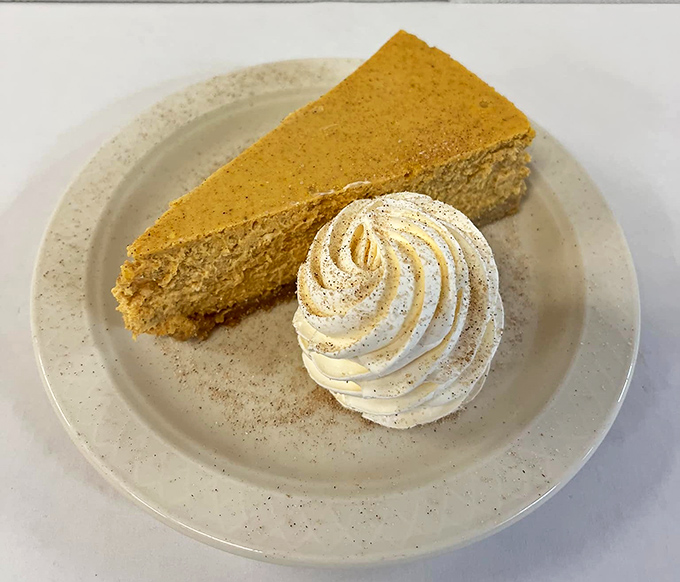 Pumpkin pie that doesn't just celebrate fall—it throws fall a parade complete with a whipped cream float and cinnamon confetti.