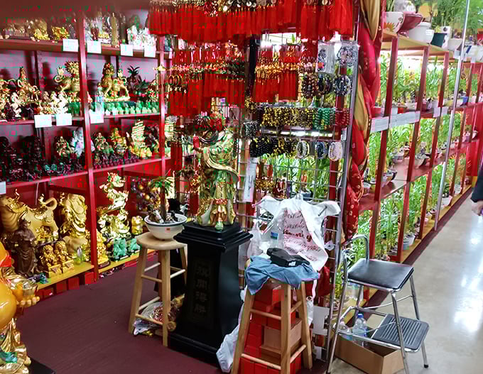 Golden dragons and crimson good luck charms create a vibrant cultural corner where shoppers can find spiritual artifacts and decorative treasures from across Asia.