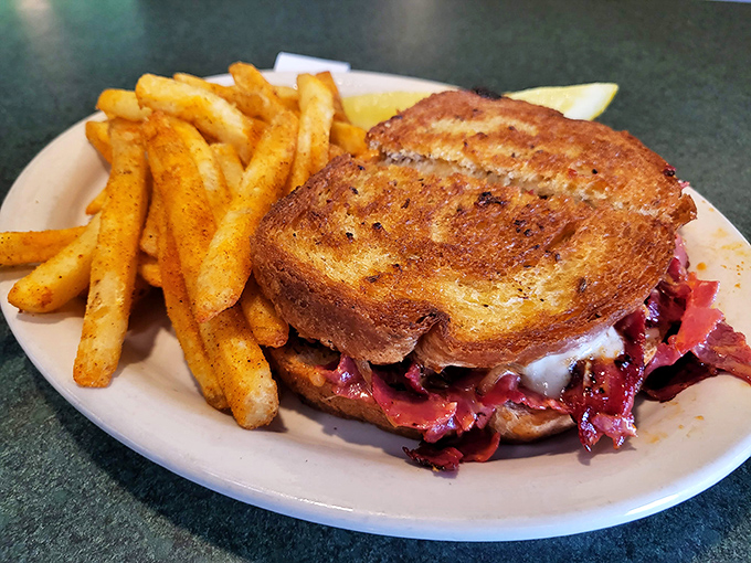 The Reuben sandwich – where corned beef, sauerkraut and melted cheese perform a delicious balancing act between two perfectly grilled slices.